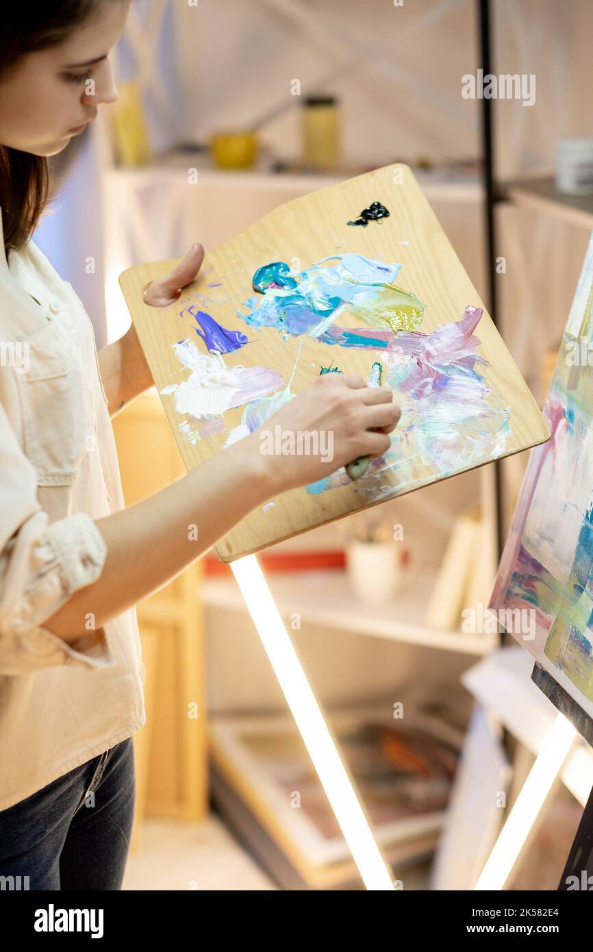 female painter art process professional artist Stock Photo - Alamy