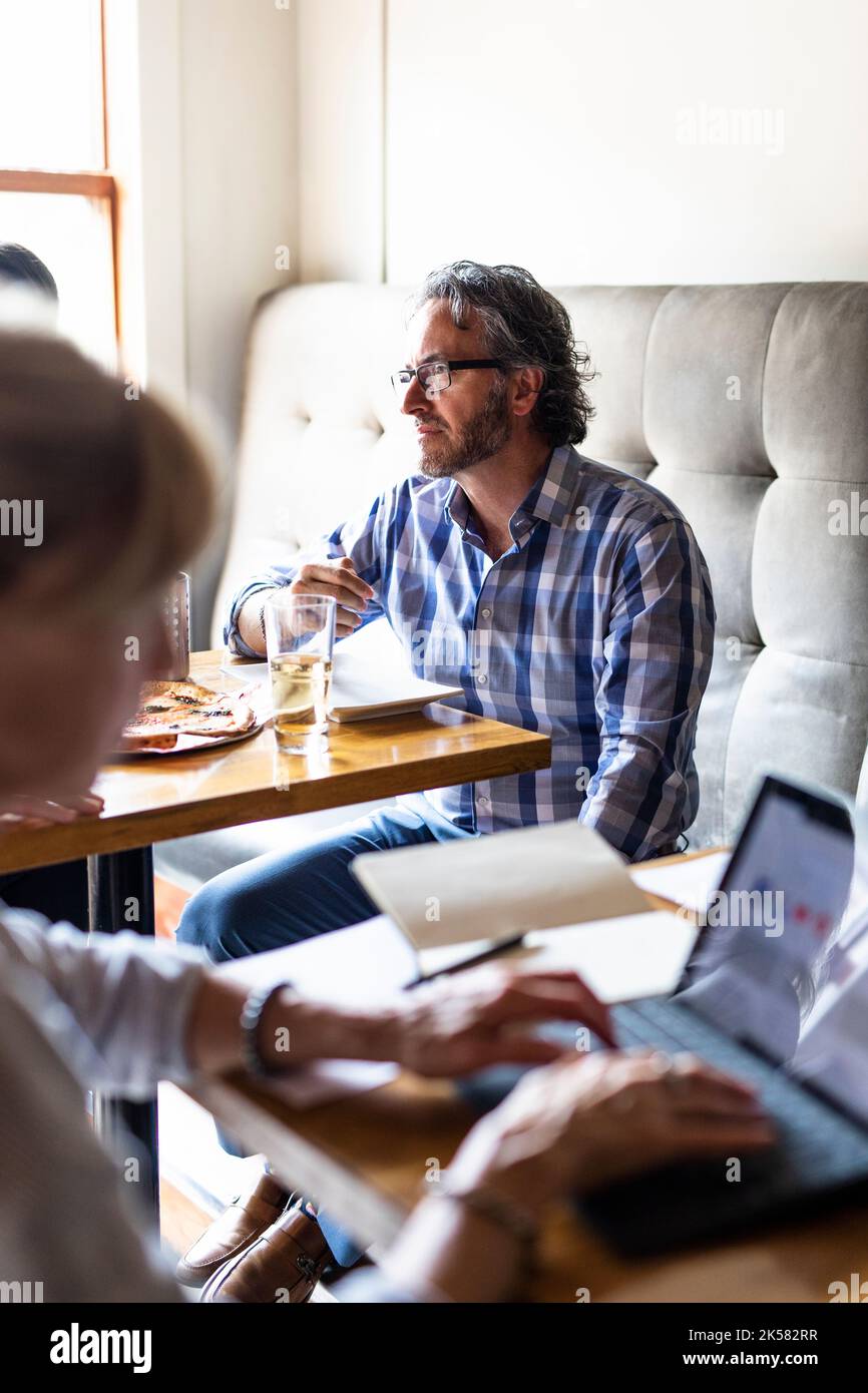 Man sitting alone at dinner table hi-res stock photography and images ...