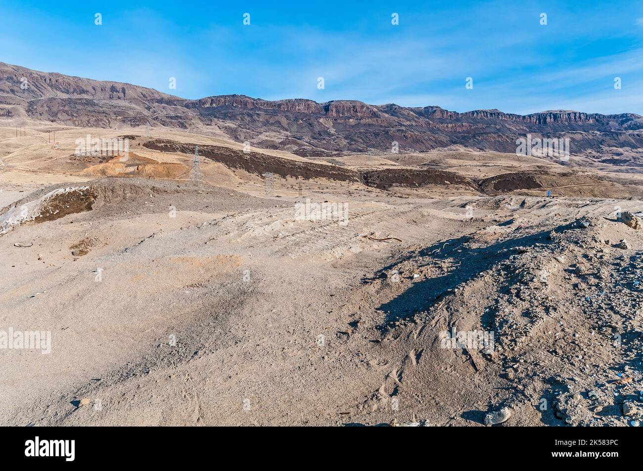 Tire and tread tracks are quite evident in the soil of an active solid ...