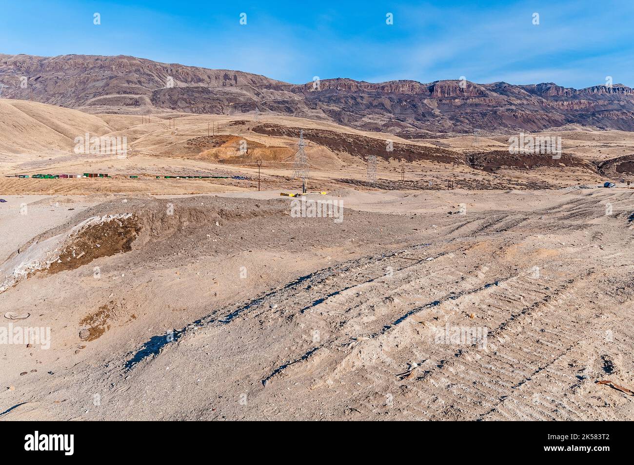 Tire and tread tracks are quite evident in the soil of an active solid ...