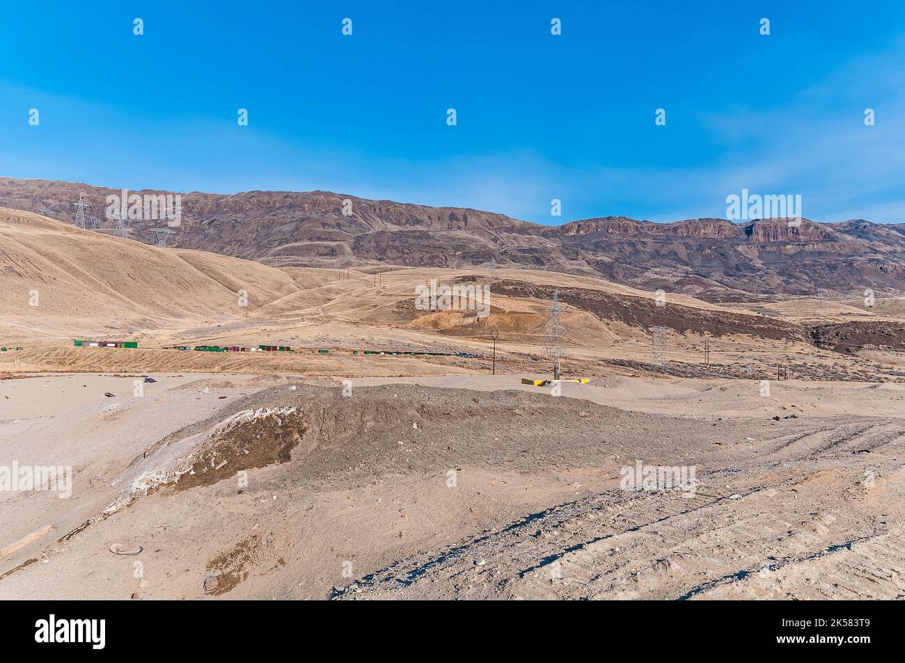 Tire and tread tracks are quite evident in the soil of an active solid ...