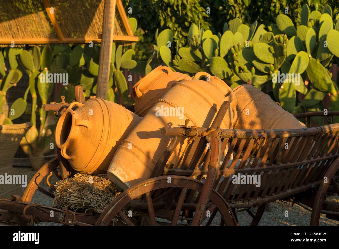 Antique ceramics loaded on a wooden cart Stock Photo - Alamy