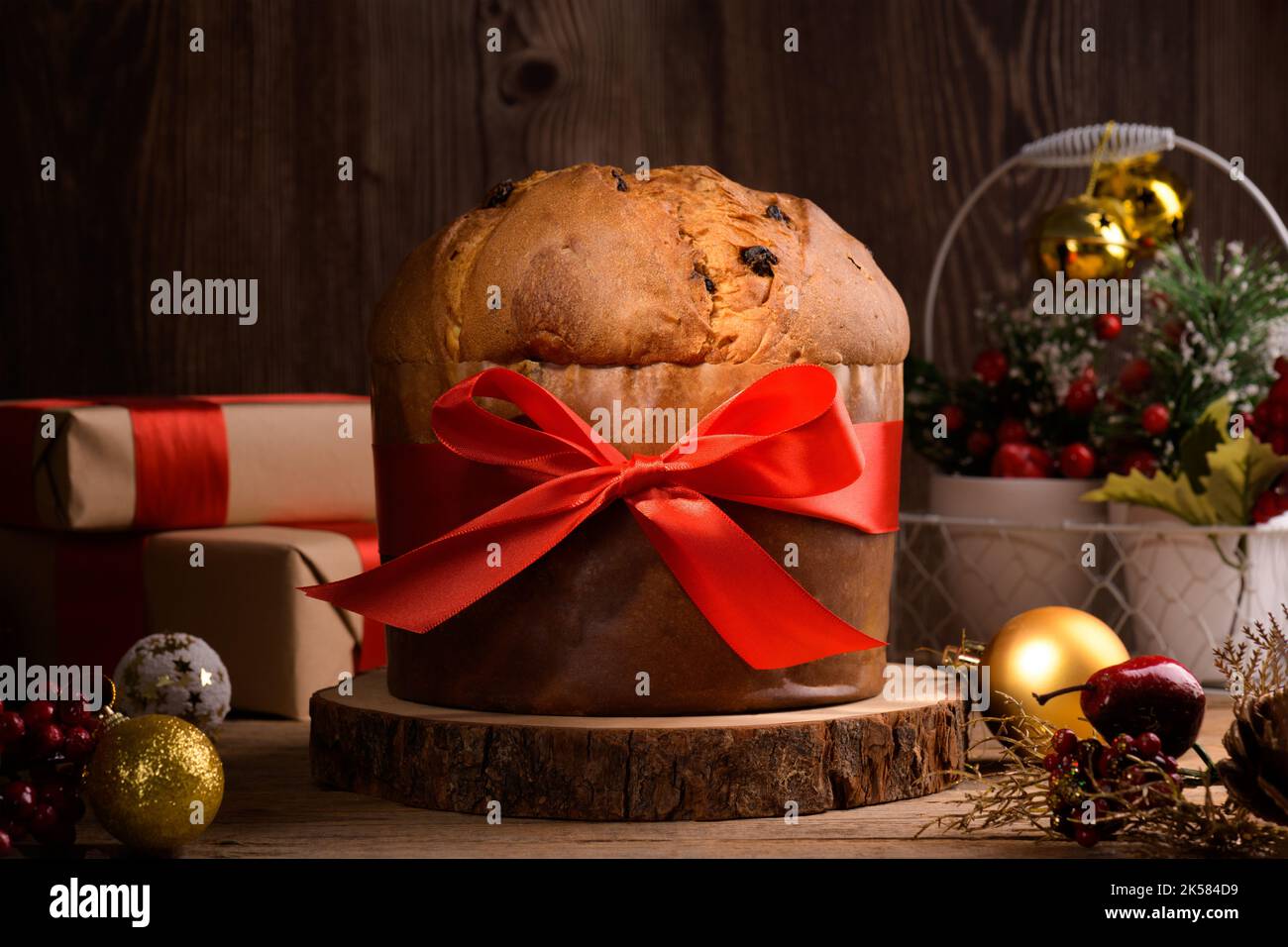 Traditional Italian Christmas Cake Panettone with red bow and festive ...