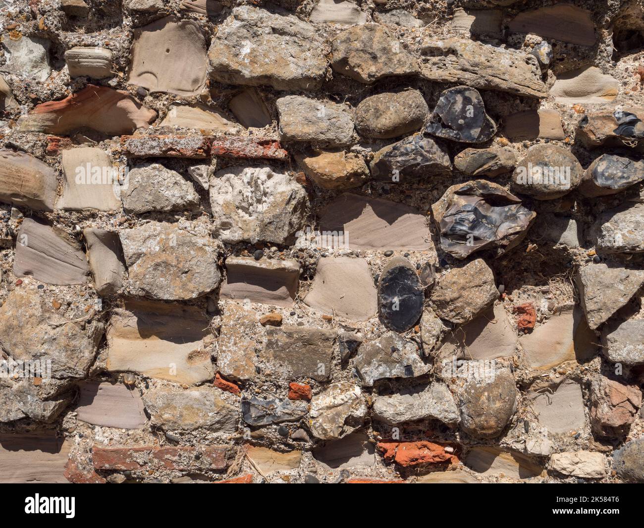 Detail showing the stonework of the medieval church at Reculver, above ...
