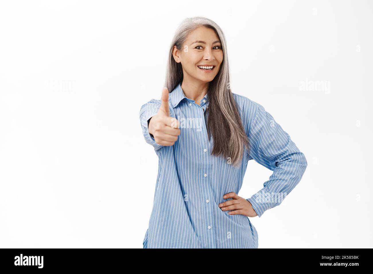 Very good, recommend. Smiling asian old woman, senior lady with gray ...