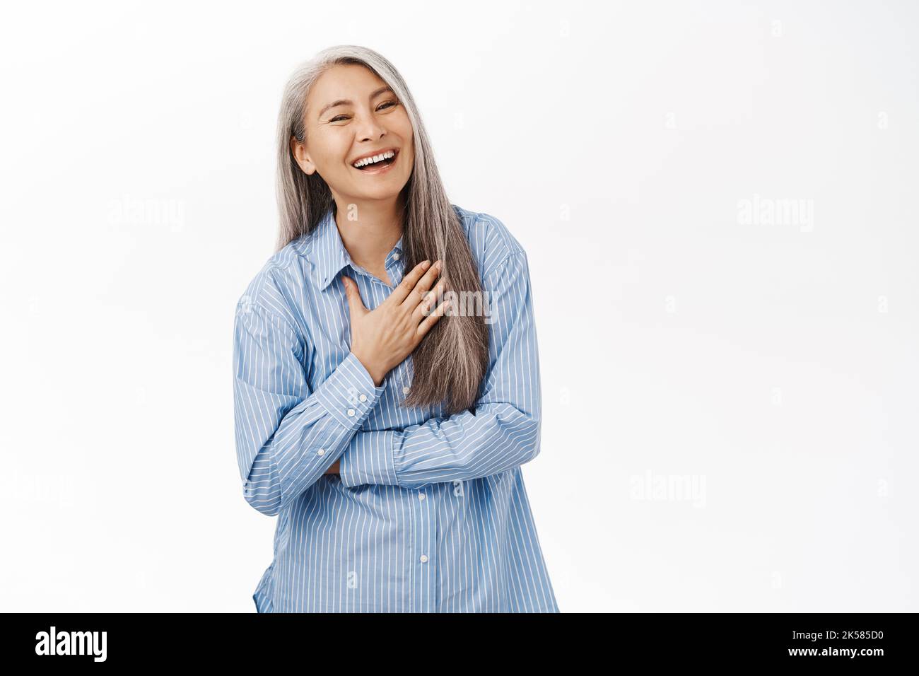 Happy korean senior woman, middle aged asian lady laughing and smiling ...