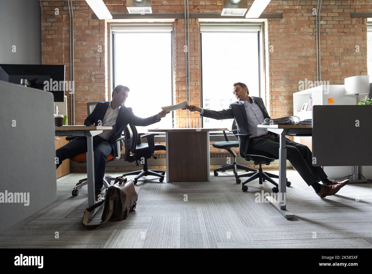 Giving paperwork hi-res stock photography and images - Alamy