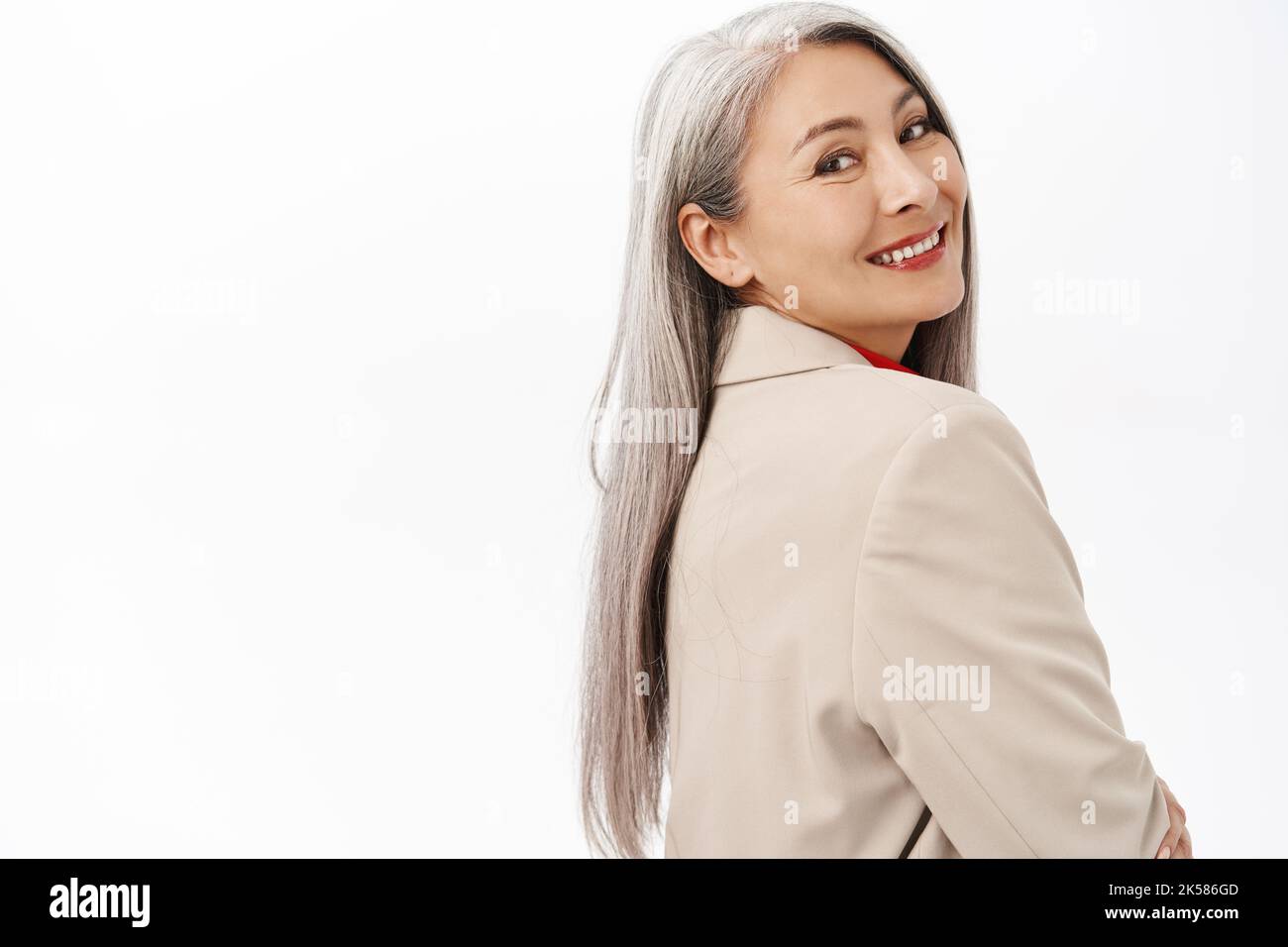 Portrait of successful asian senior businesswoman, smiling and looking ...