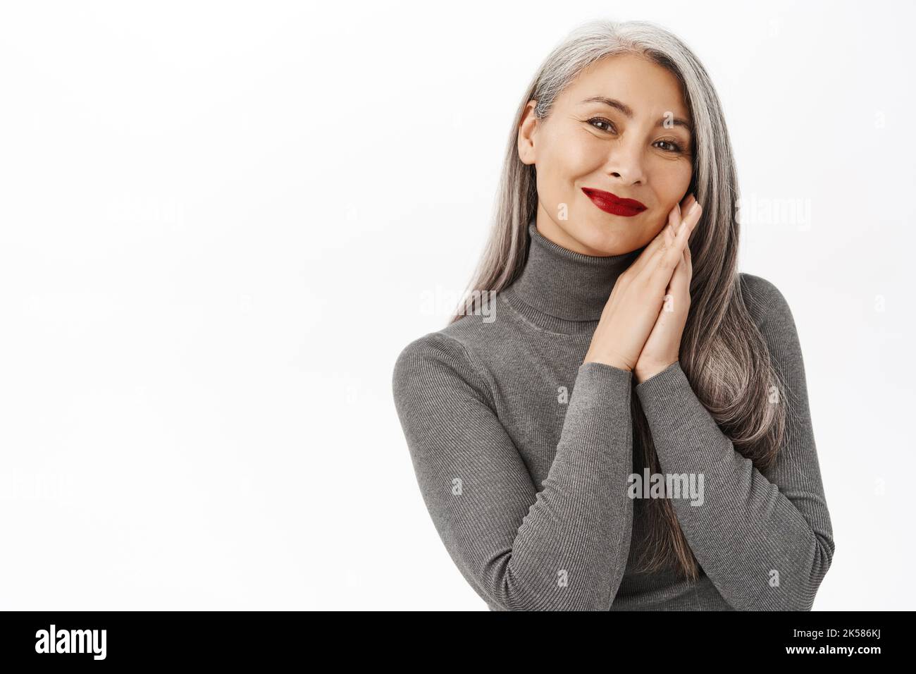 Beautiful middle-aged japanese woman, wearing red lipstick makeup ...