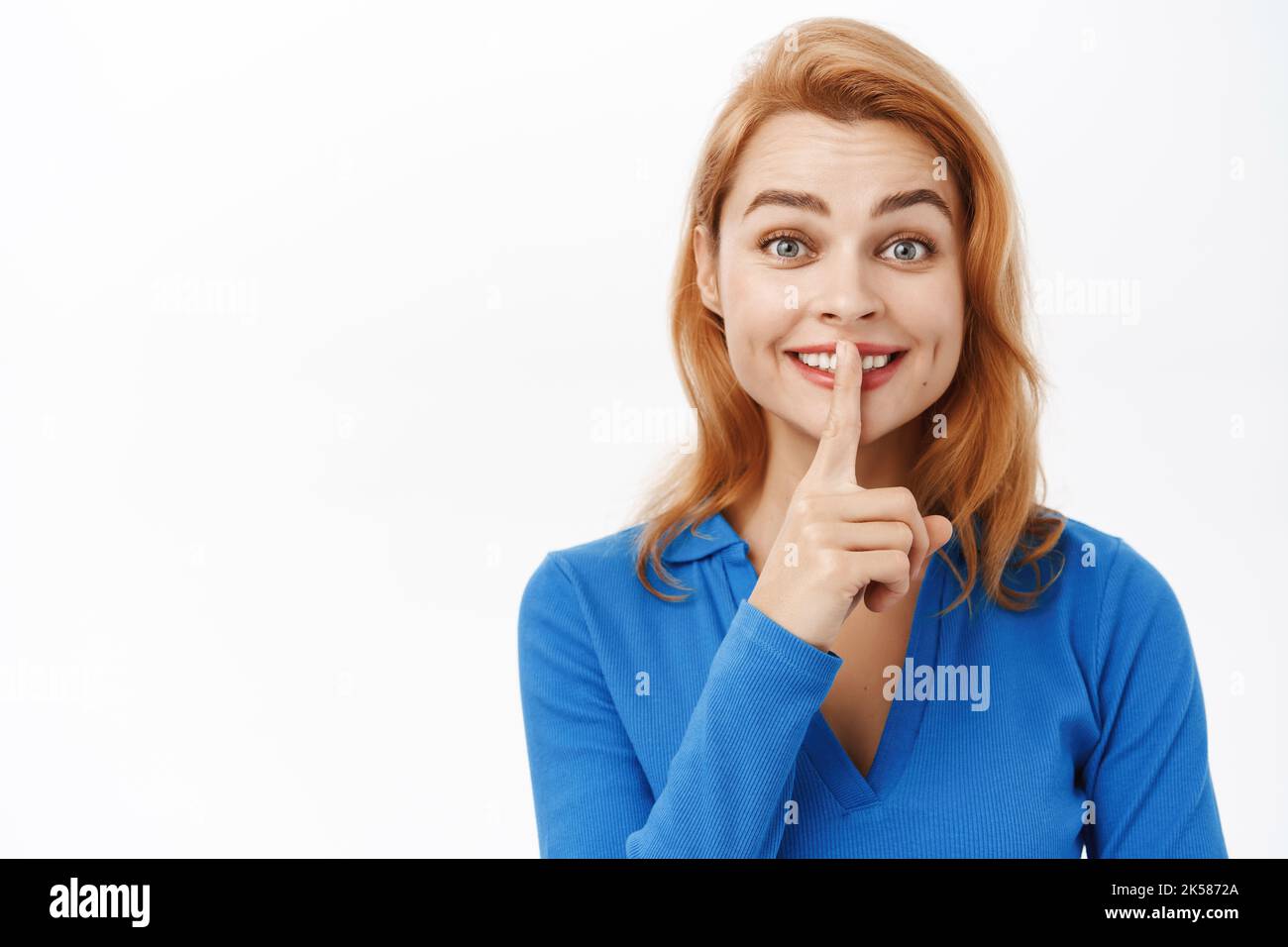 Close up portrait of excited girl say shh, shush taboo sign, press ...