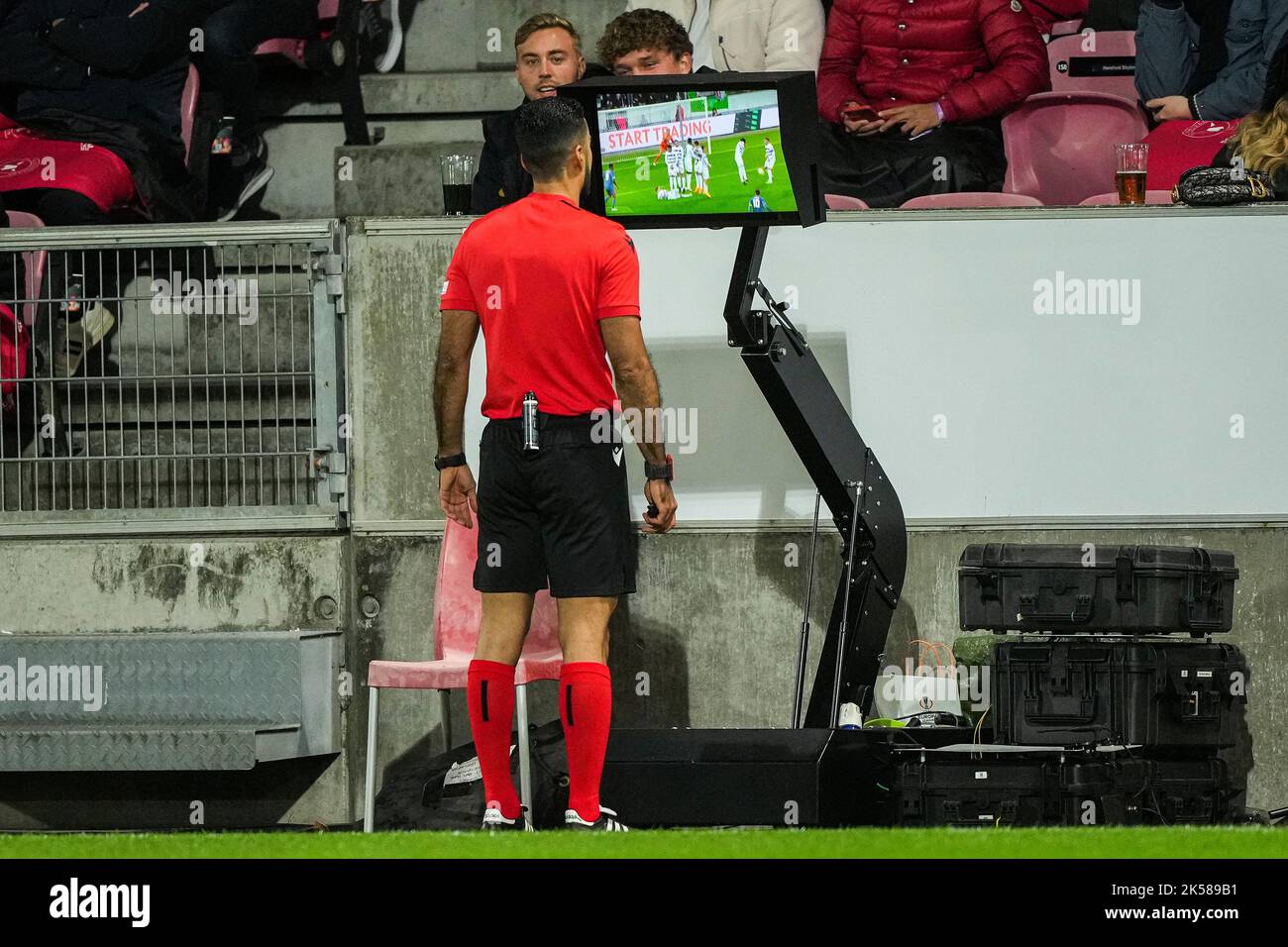 Herning - Referee Mohammed Al-Hakim checks a possible penalty during ...
