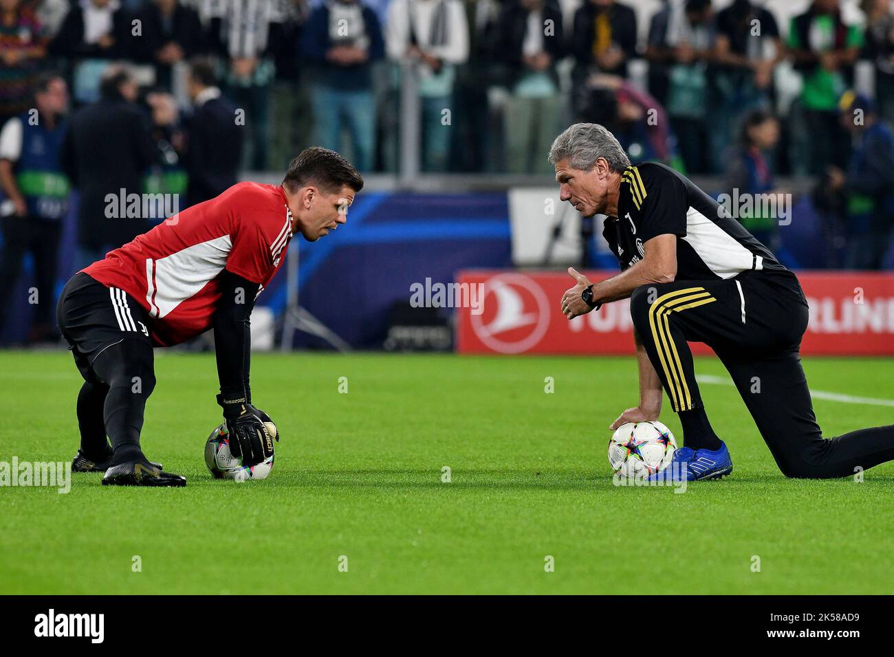 Wojciech Szczesny of Juventus FC warms up with Claudio Filippi ...