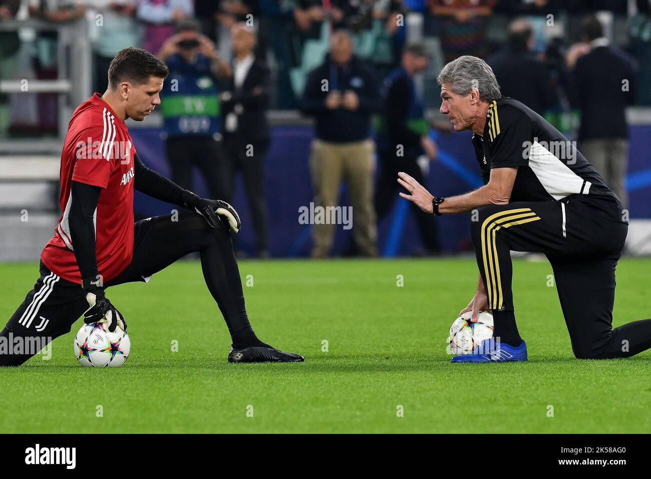 Wojciech Szczesny of Juventus FC warms up with Claudio Filippi ...