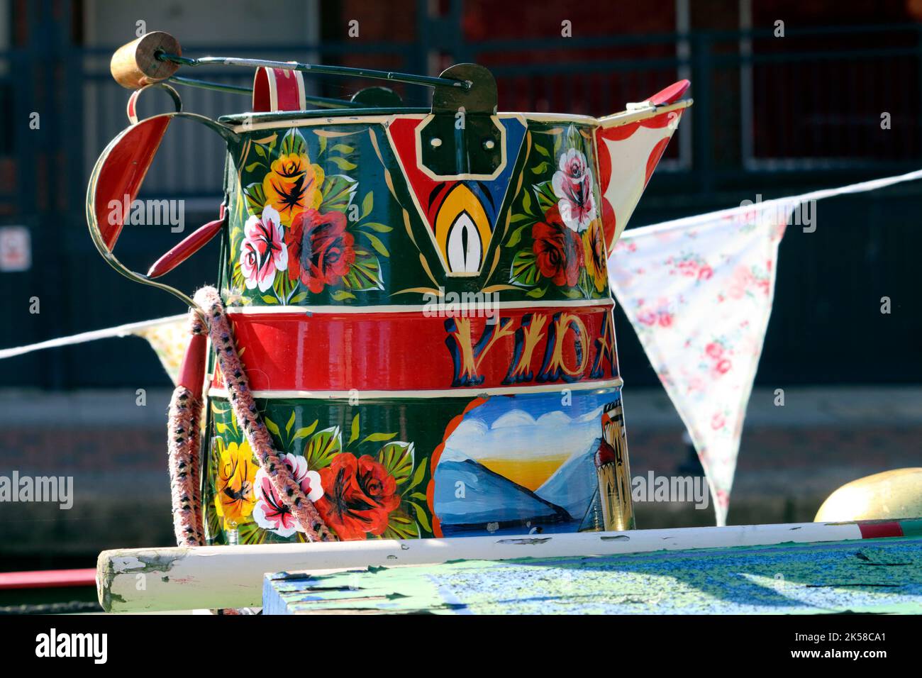 A traditionally painted water pail on a narrowboat at the 2022 Banbury ...