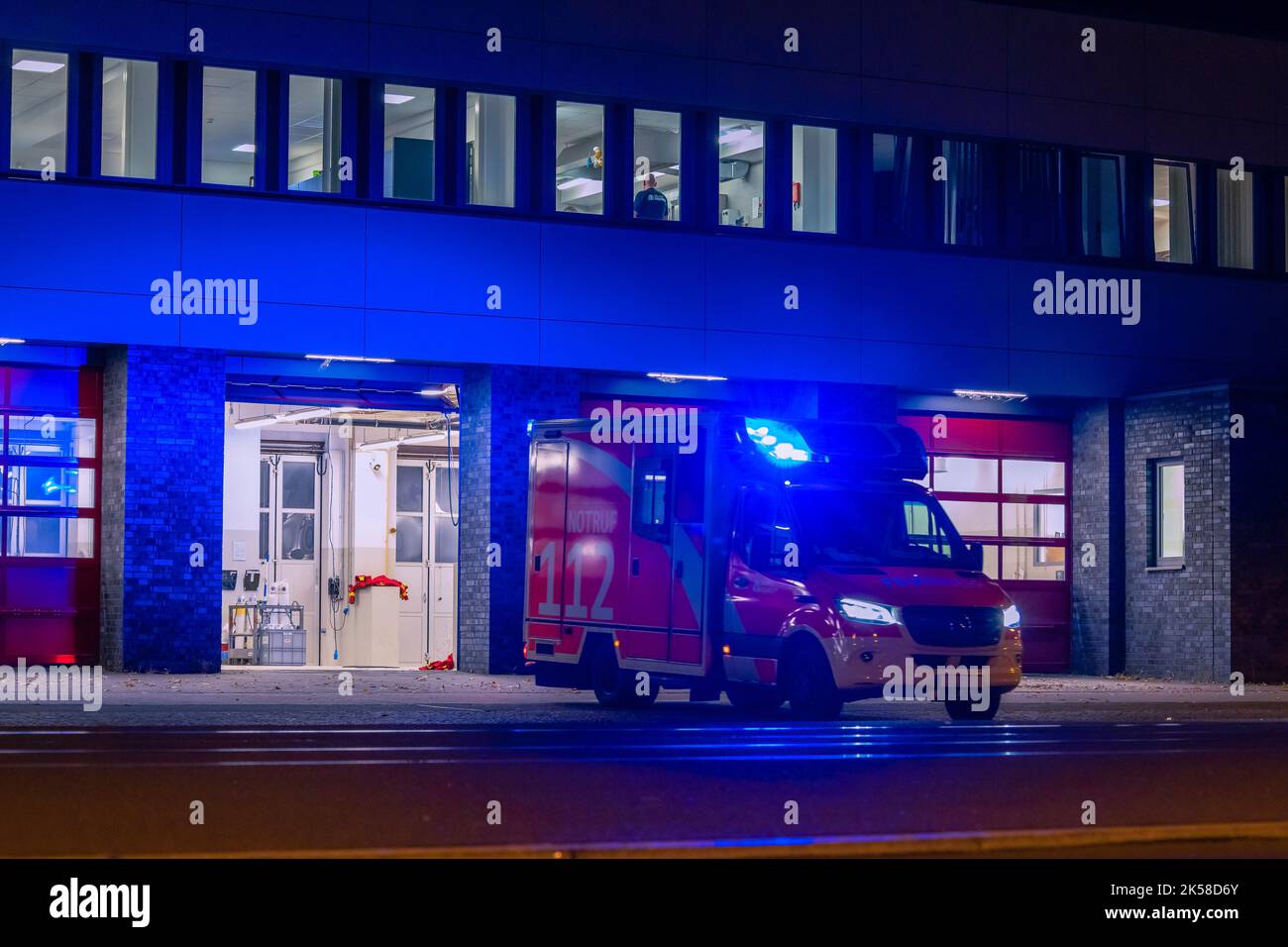 Ambulance at night, blue light, fire department, berlin, germany, out ...