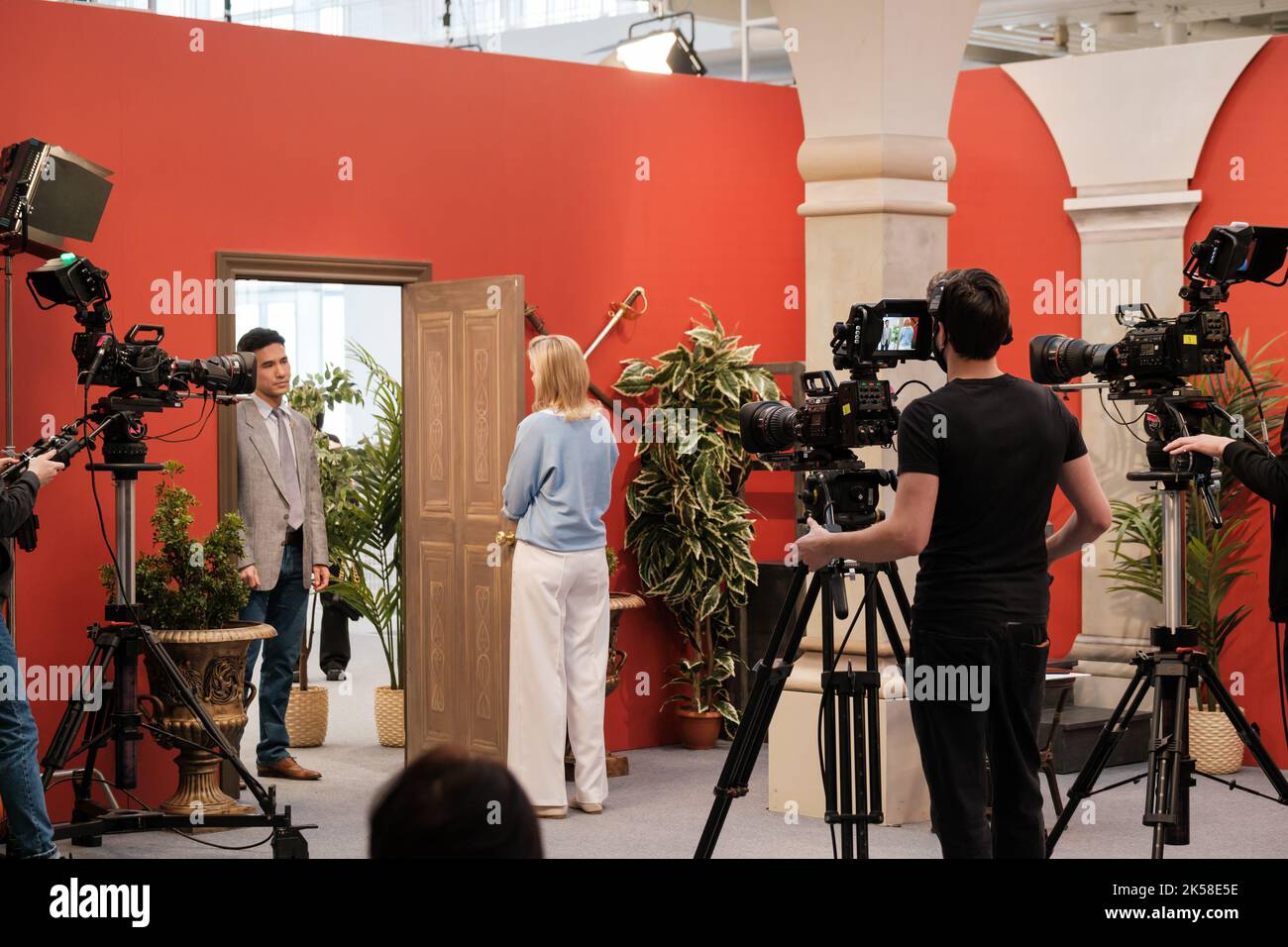 Filmmaking crew shooting scene for movie Stock Photo - Alamy