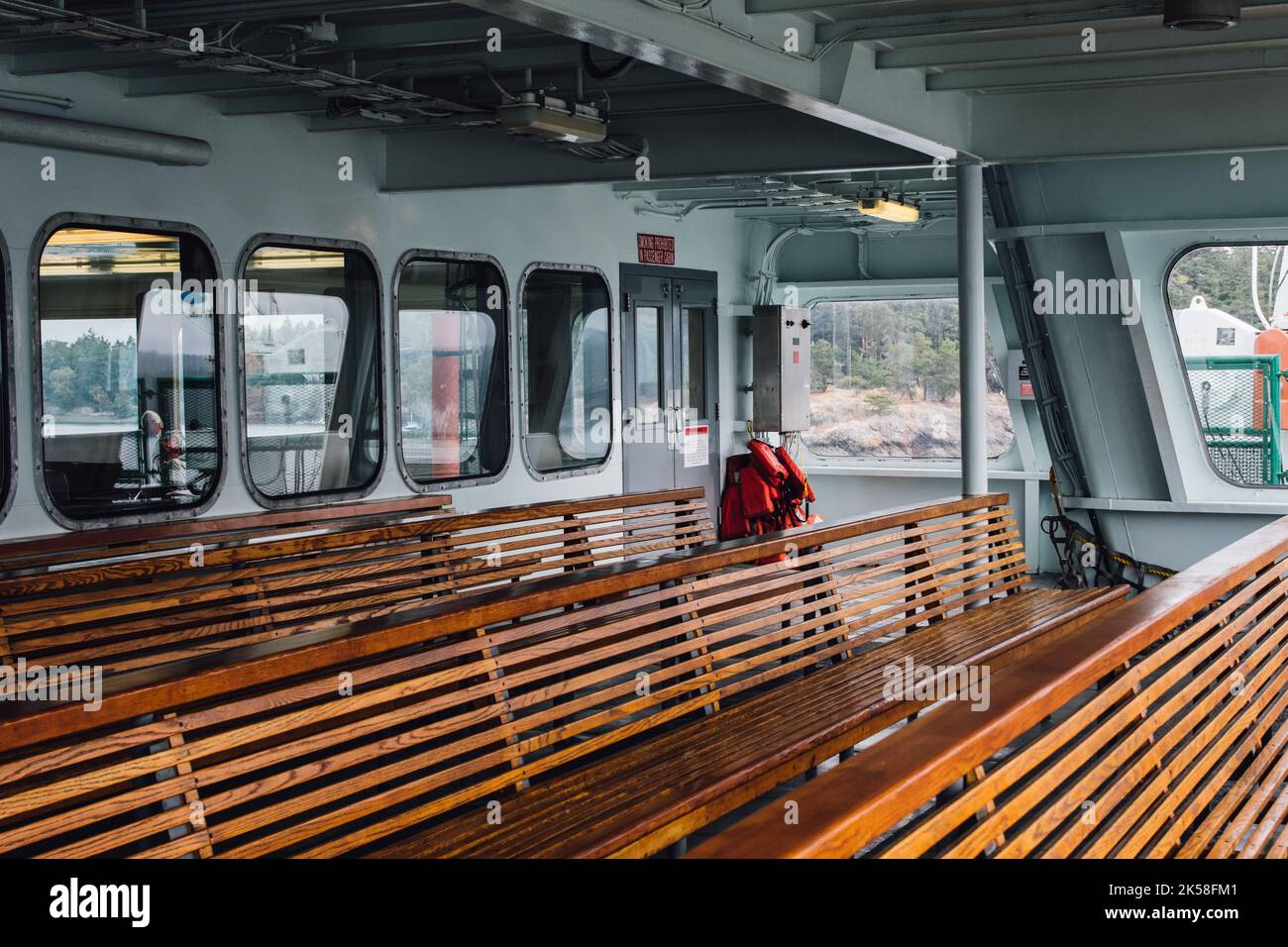 wooden benches on deck of Pacific Northwest, Washington State ferry ...