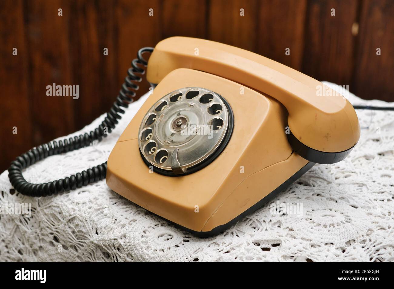 Old-fashioned retro style plastic telephone with rotary dial. Vintage ...