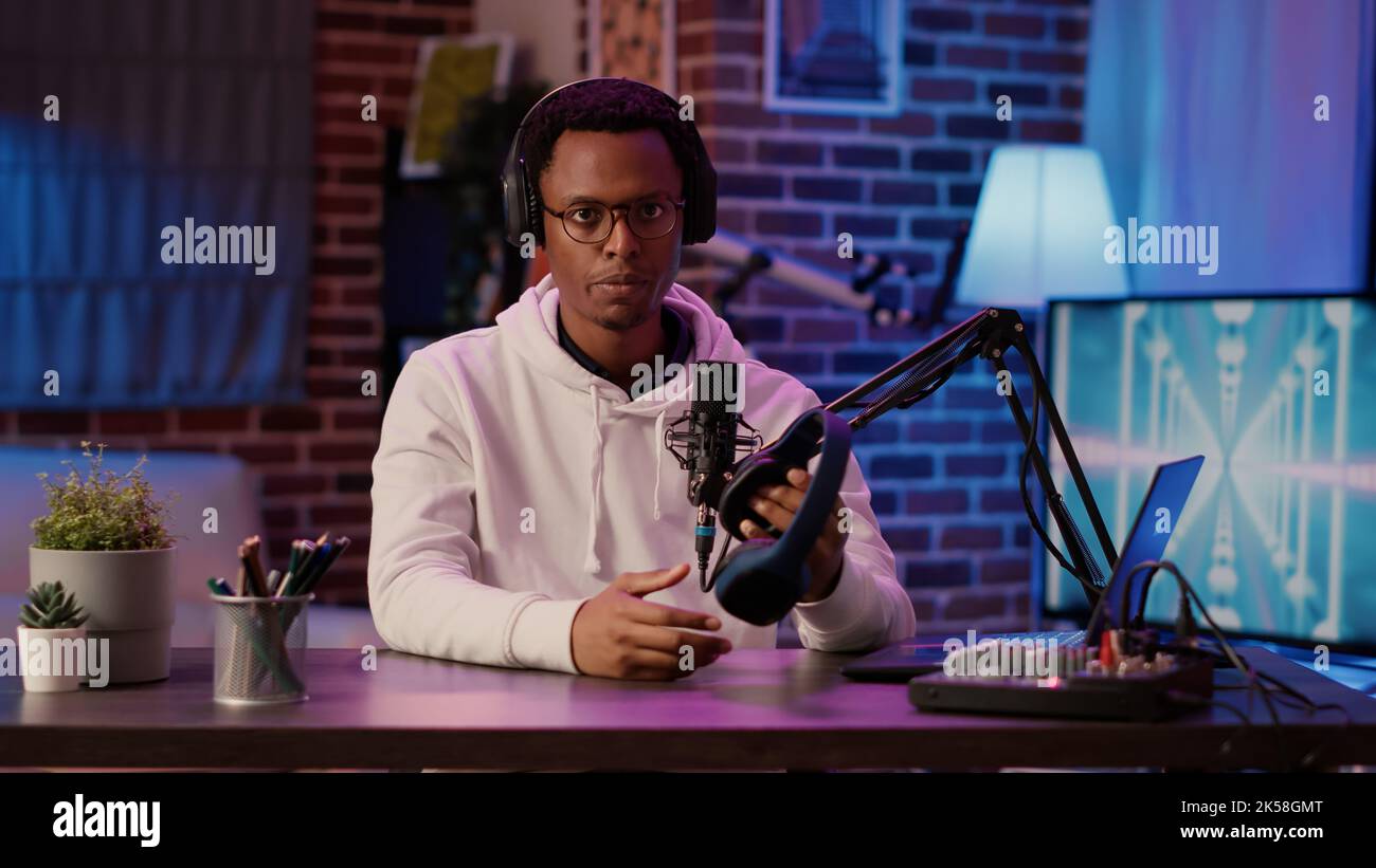 African american content creator recording product review testing ...