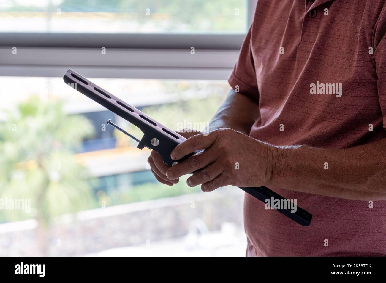 latino man looking for tools in his toolbox, hispanic, with screwdriver ...