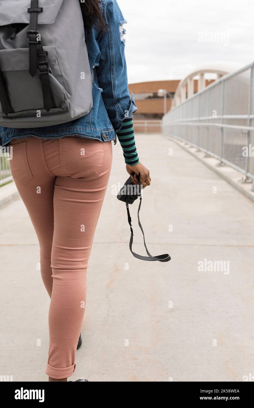 Young woman and backpack and rear hi-res stock photography and images ...