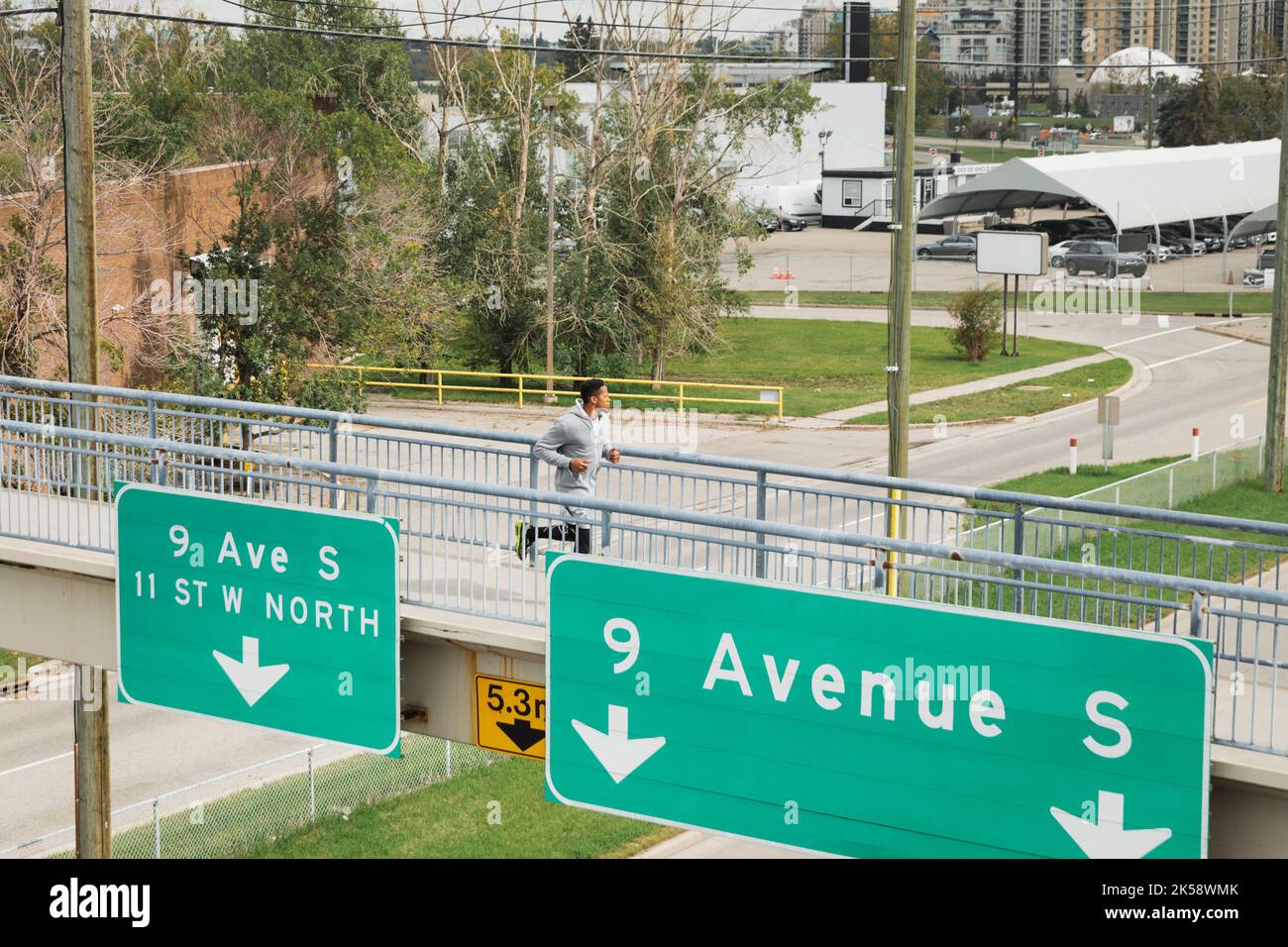 Footbridge with road signs hi-res stock photography and images - Alamy