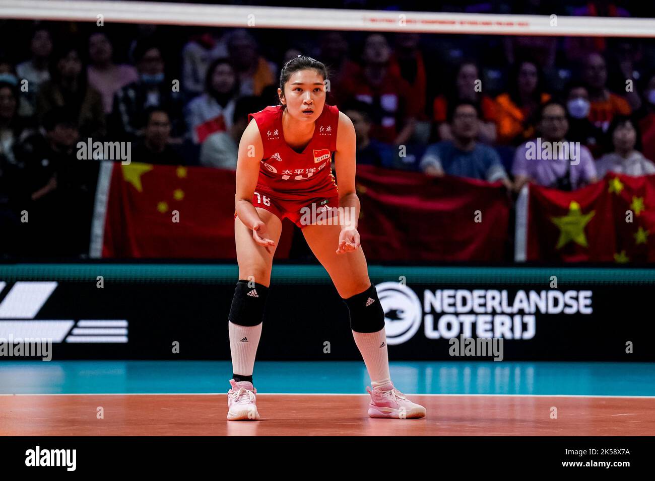 ROTTERDAM, NETHERLANDS - OCTOBER 6: Mengjie Wang of China waits for the serve to be played ...