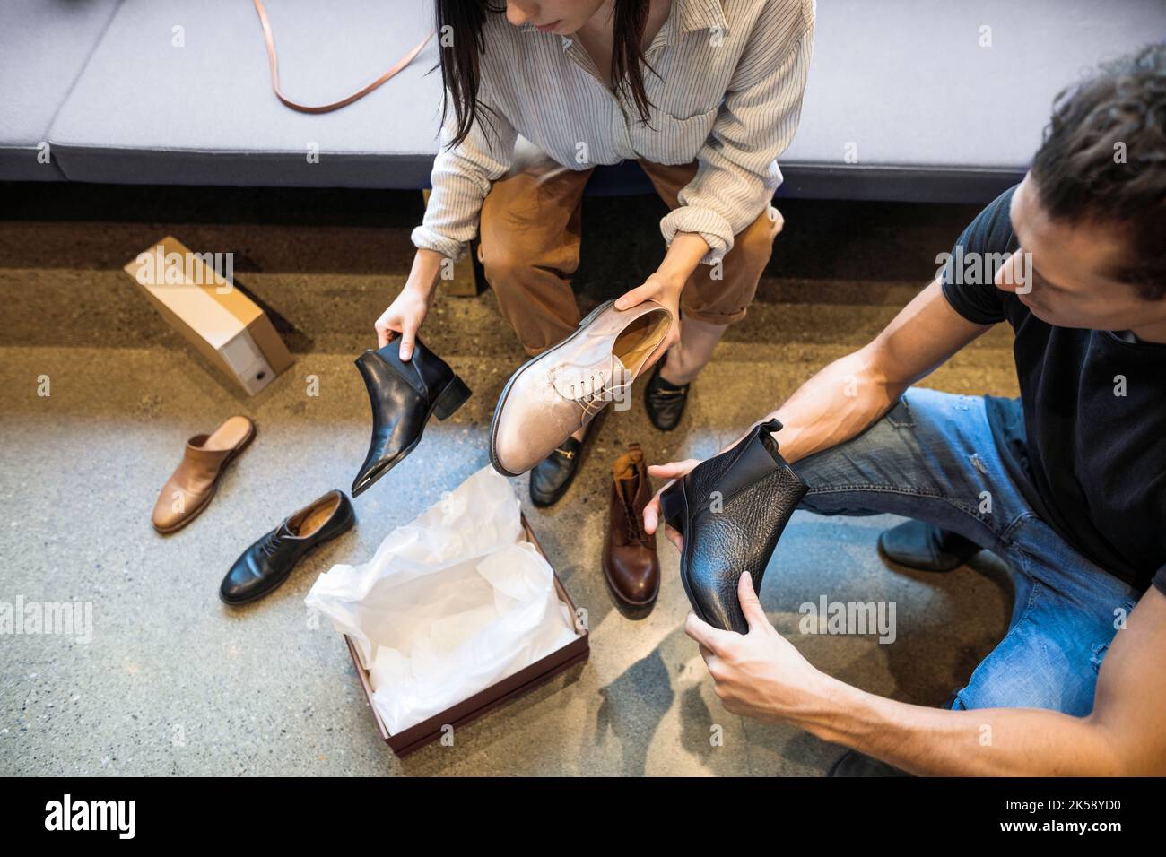 Woman trying on new shoes hi-res stock photography and images - Alamy