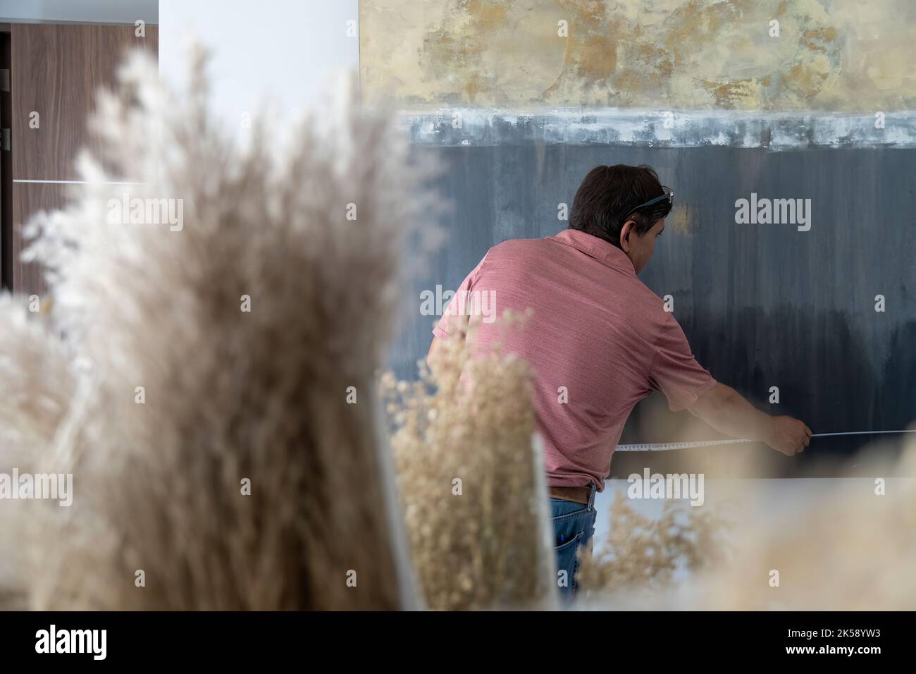 Young painter doing house renovation hi-res stock photography and ...