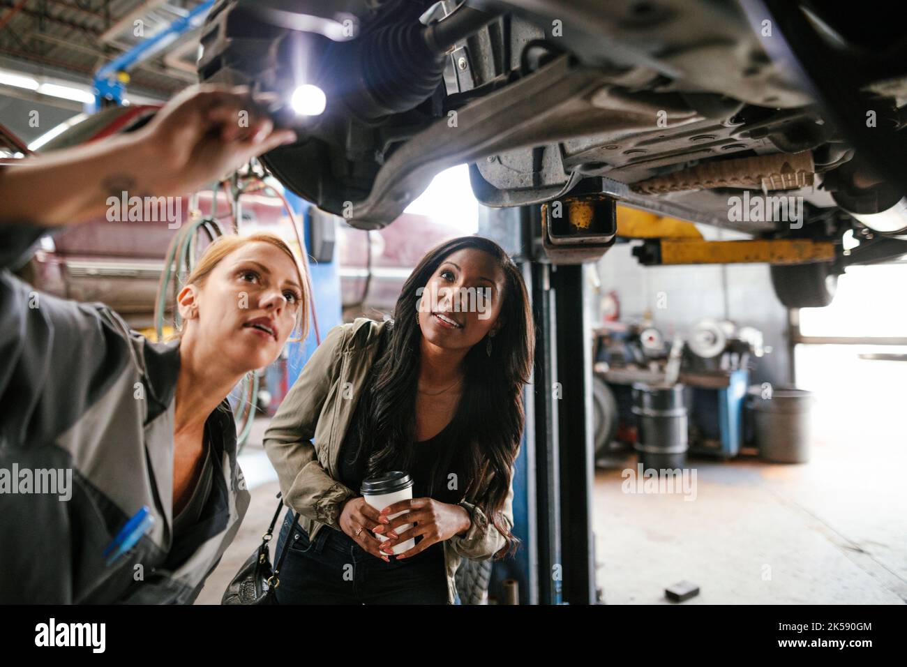Mechanic under vehicle hi-res stock photography and images - Alamy