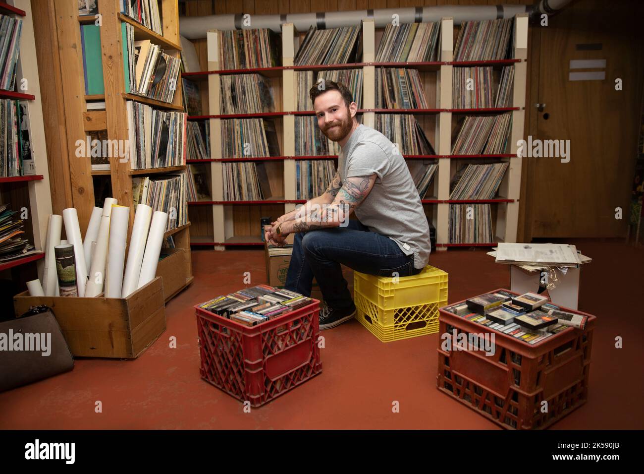 Man looking at records hi-res stock photography and images - Alamy