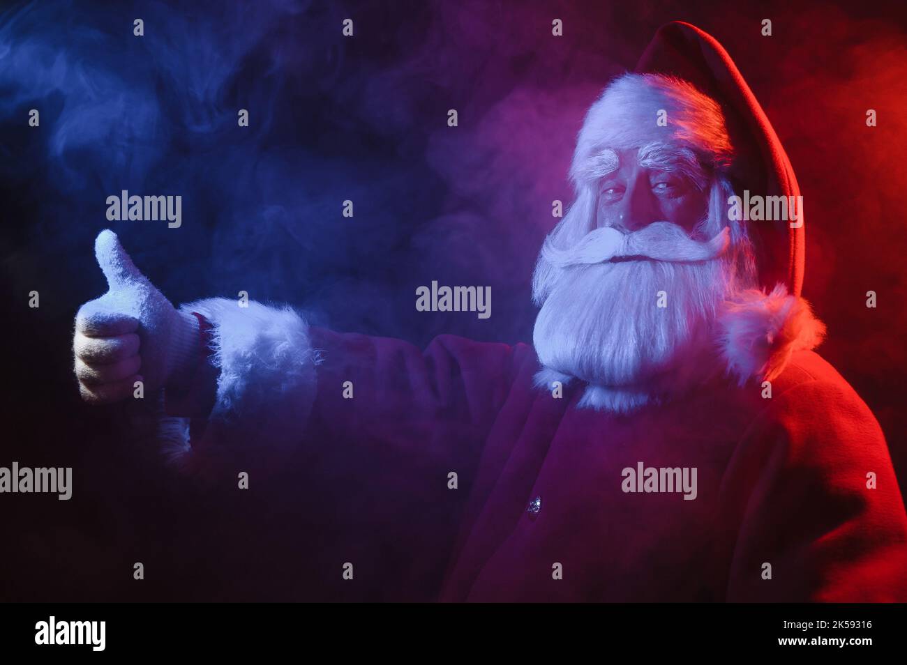 Santa Claus portrait in blue red neon light and smoke Stock Photo - Alamy
