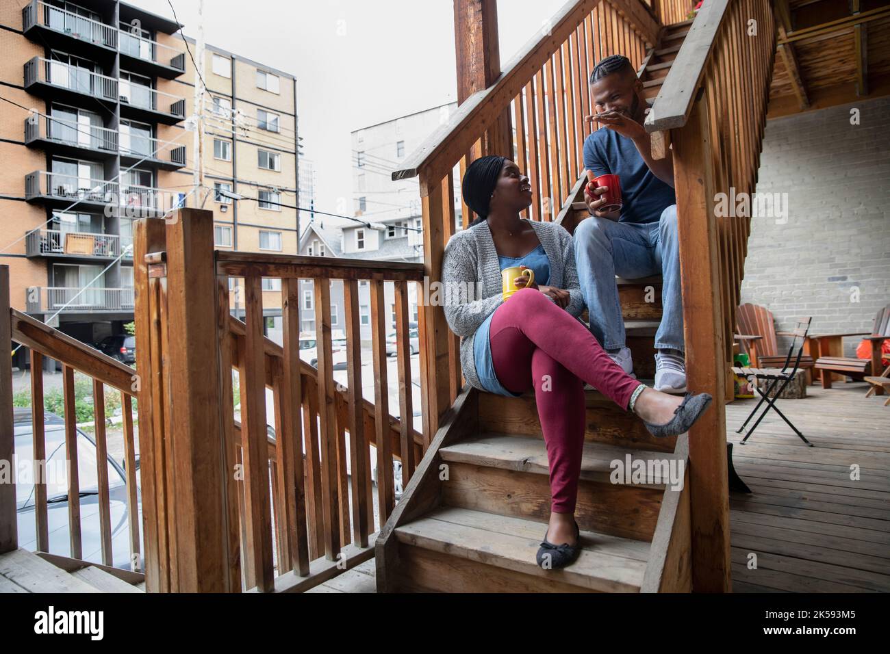 Neighbor talking stairs hi-res stock photography and images - Alamy