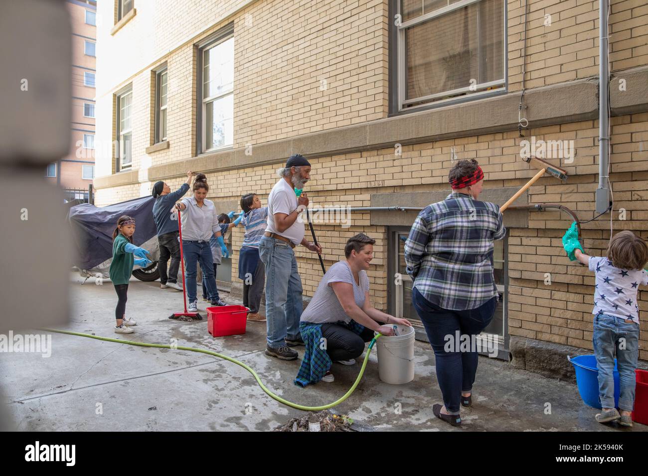 Helping building hi-res stock photography and images - Alamy