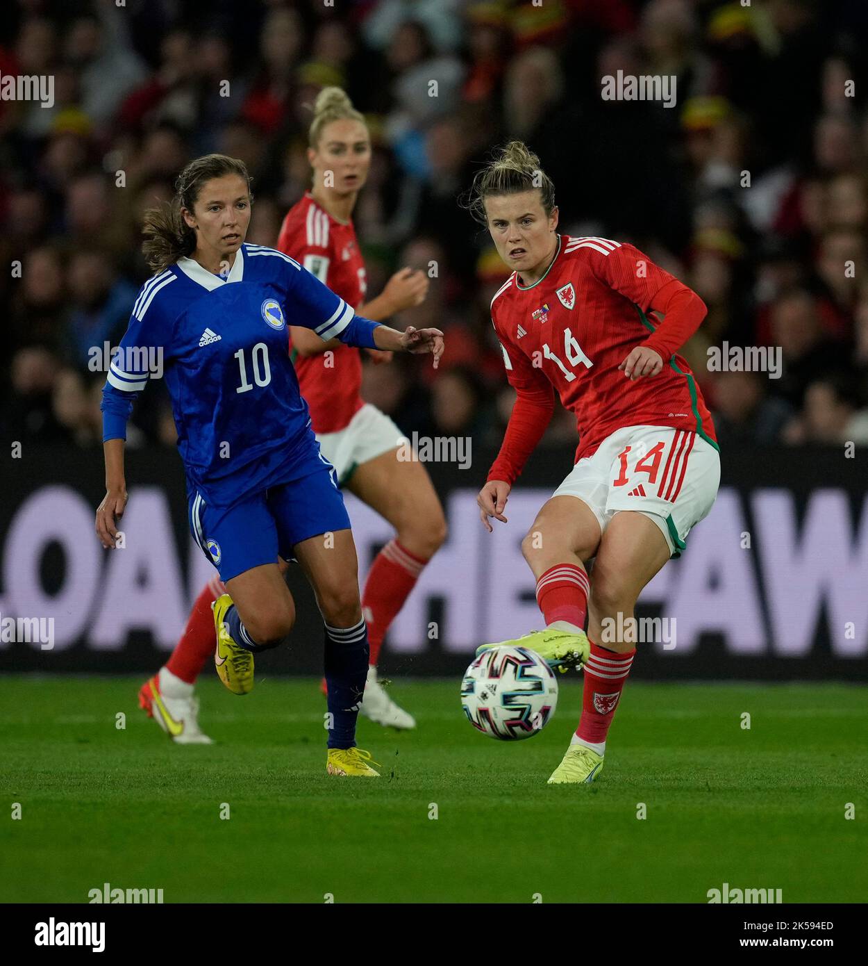 Cardiff, Wales, 6, October, 2022,Hayley Ladd (Wales) (R) passes ball ...