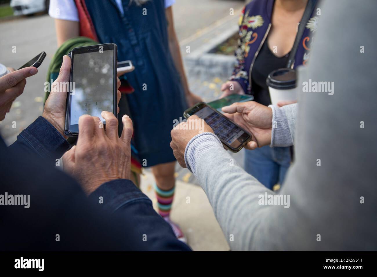 Asian men using mobile phones hi-res stock photography and images - Alamy