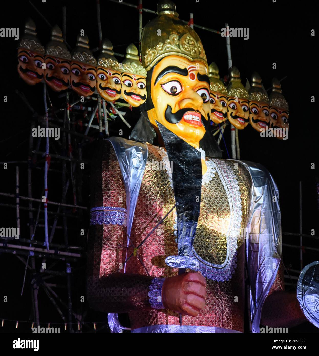 Kolkata, West Bengal, India. 5th Oct, 2022. People watch the burning of ...