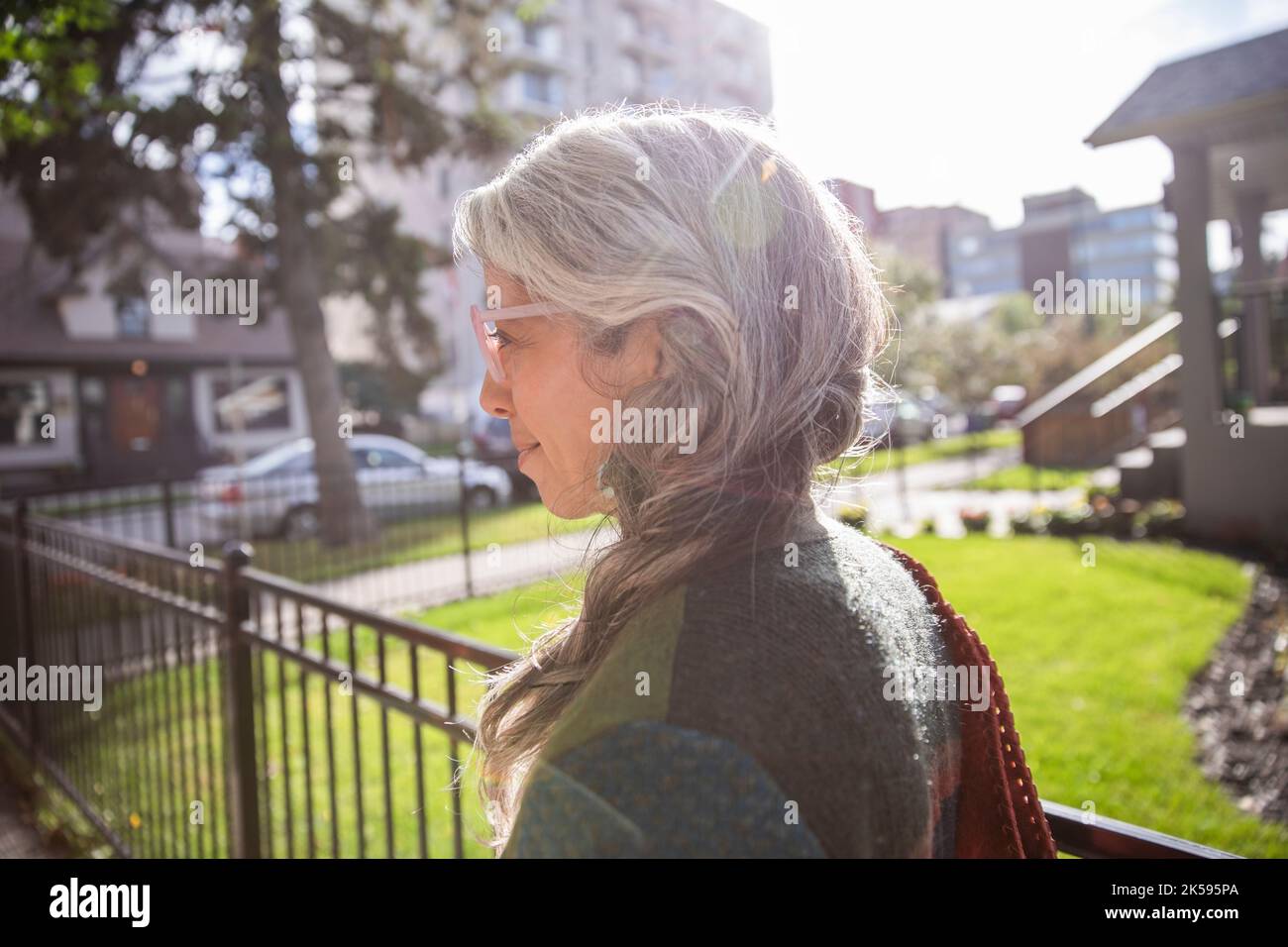 Woman side profile walking hi-res stock photography and images - Alamy