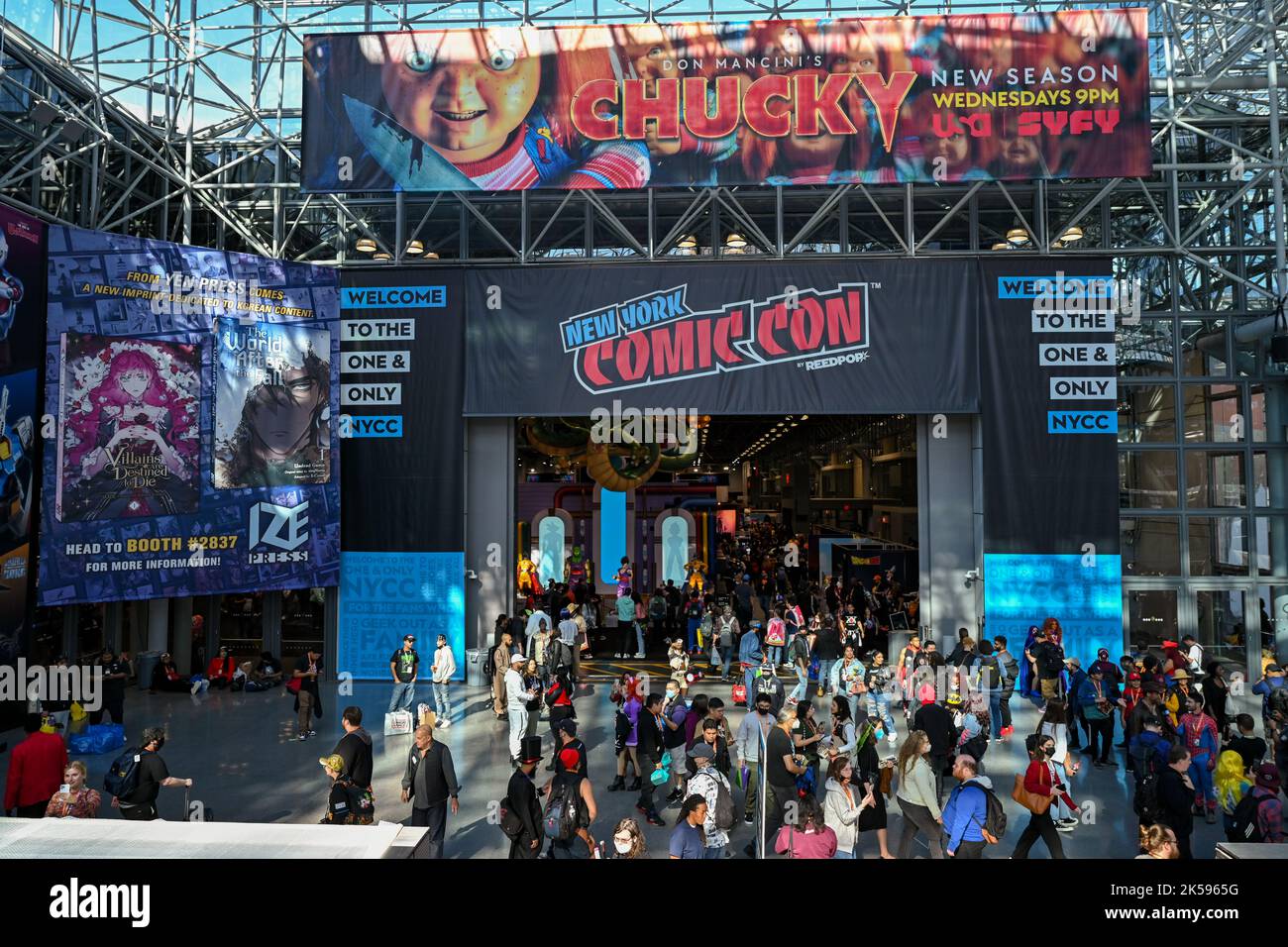 People attend New York Comic Con at the Javits Center on October 06 ...