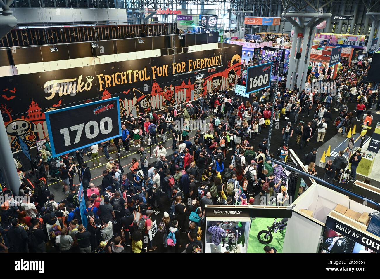 People attend New York Comic Con at the Javits Center on October 06 ...