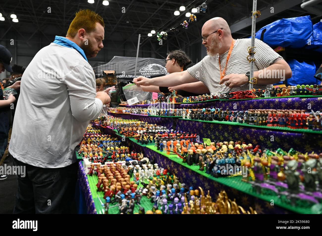 People attend New York Comic Con at the Javits Center on October 06 ...