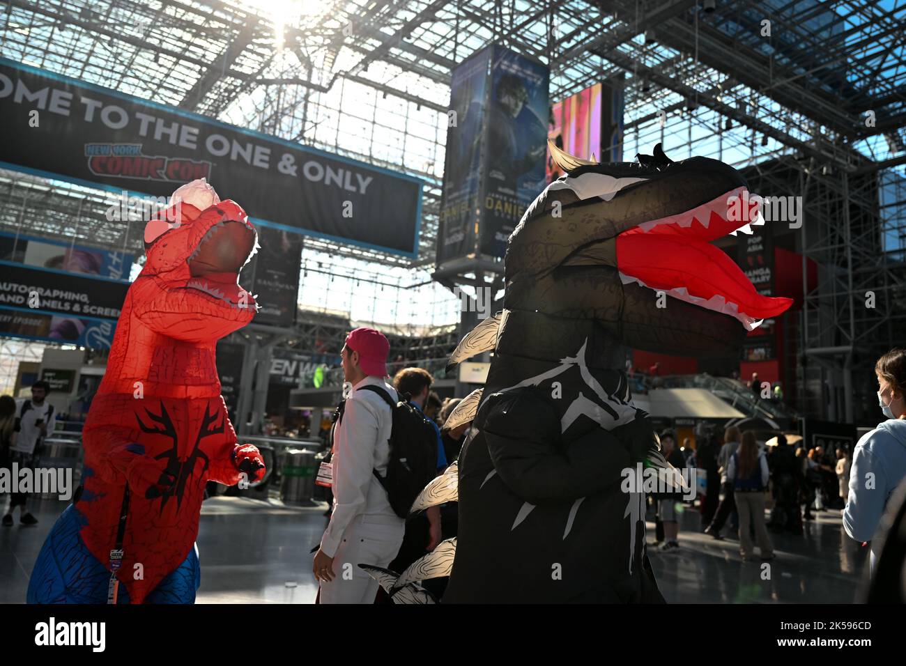 People attend New York Comic Con at the Javits Center on October 06 ...