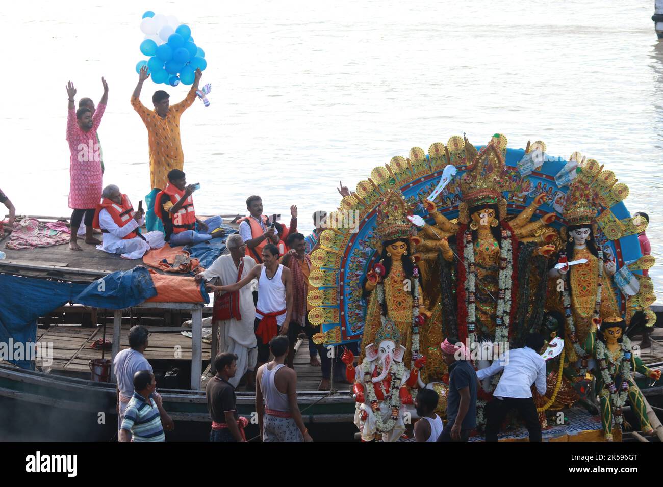 Kolkata, West Bengal, India. 5th Oct, 2022. Hindu devotees in boats ...