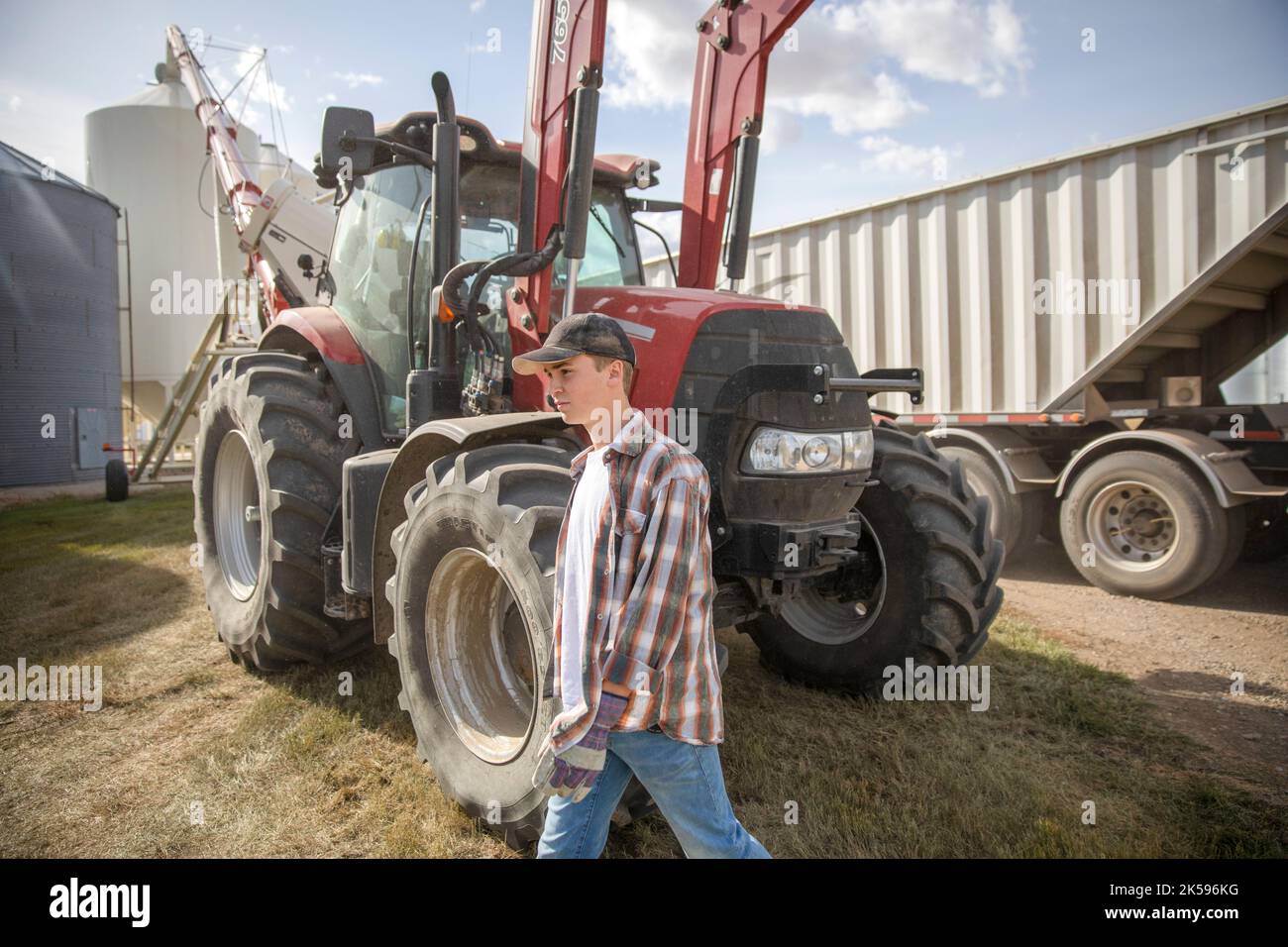 Boy on tractor hi-res stock photography and images - Alamy