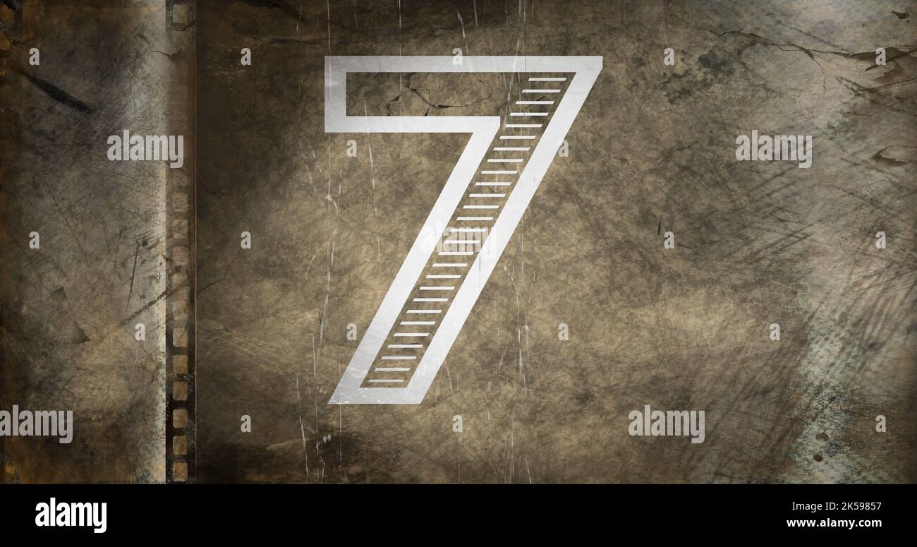 Composite of number 7 against rusty metallic background, copy space ...
