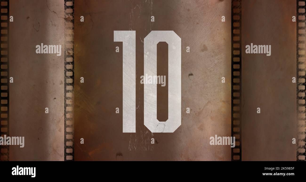 Composite of white number 10 text over old grudged film negative, copy ...