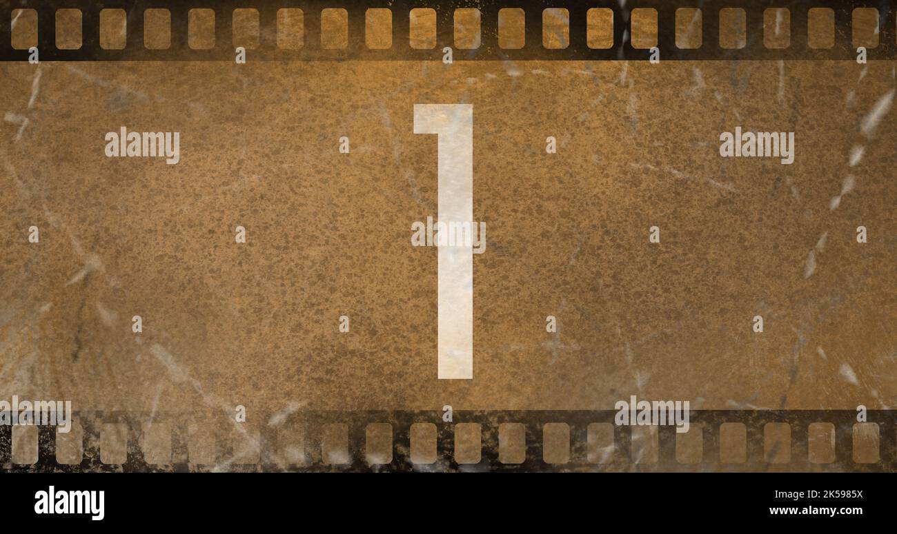 Composite of white colored number 1 text on old negative camera film ...