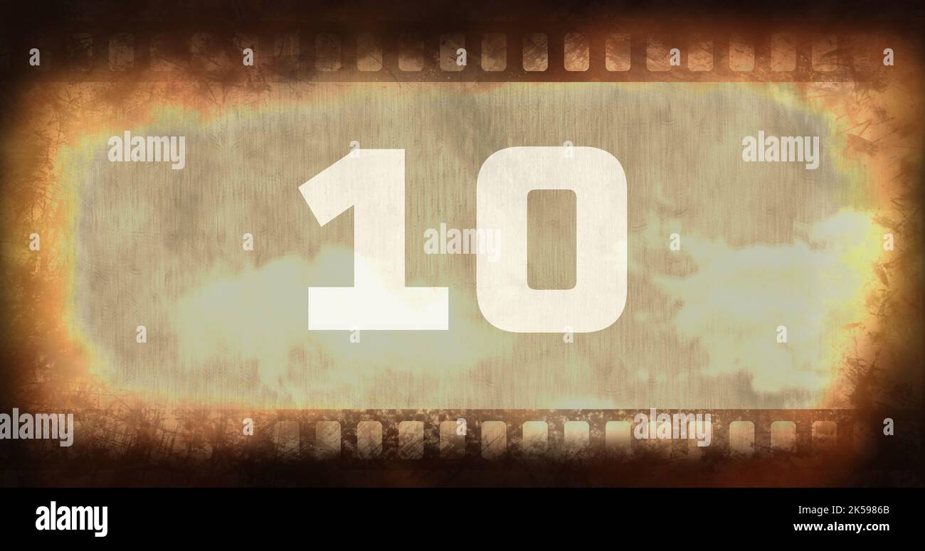 Composite of number 10 text over old rusty negative camera film with ...