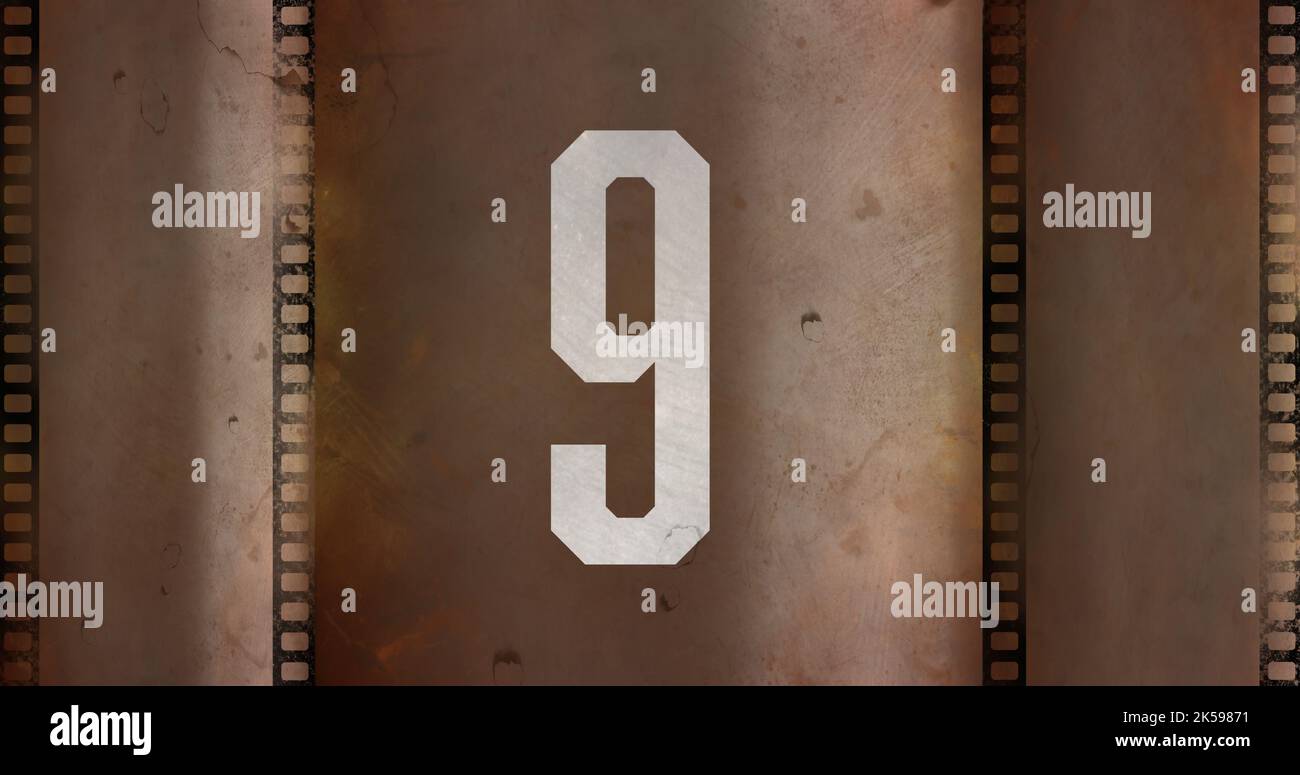 Composite of white number 9 text over old grudged film negative, copy ...