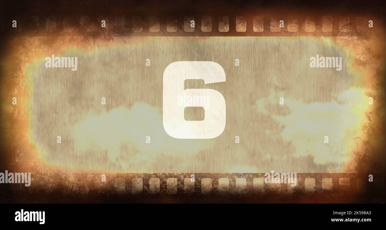 Composite of number 6 text over old rusty negative camera film with ...